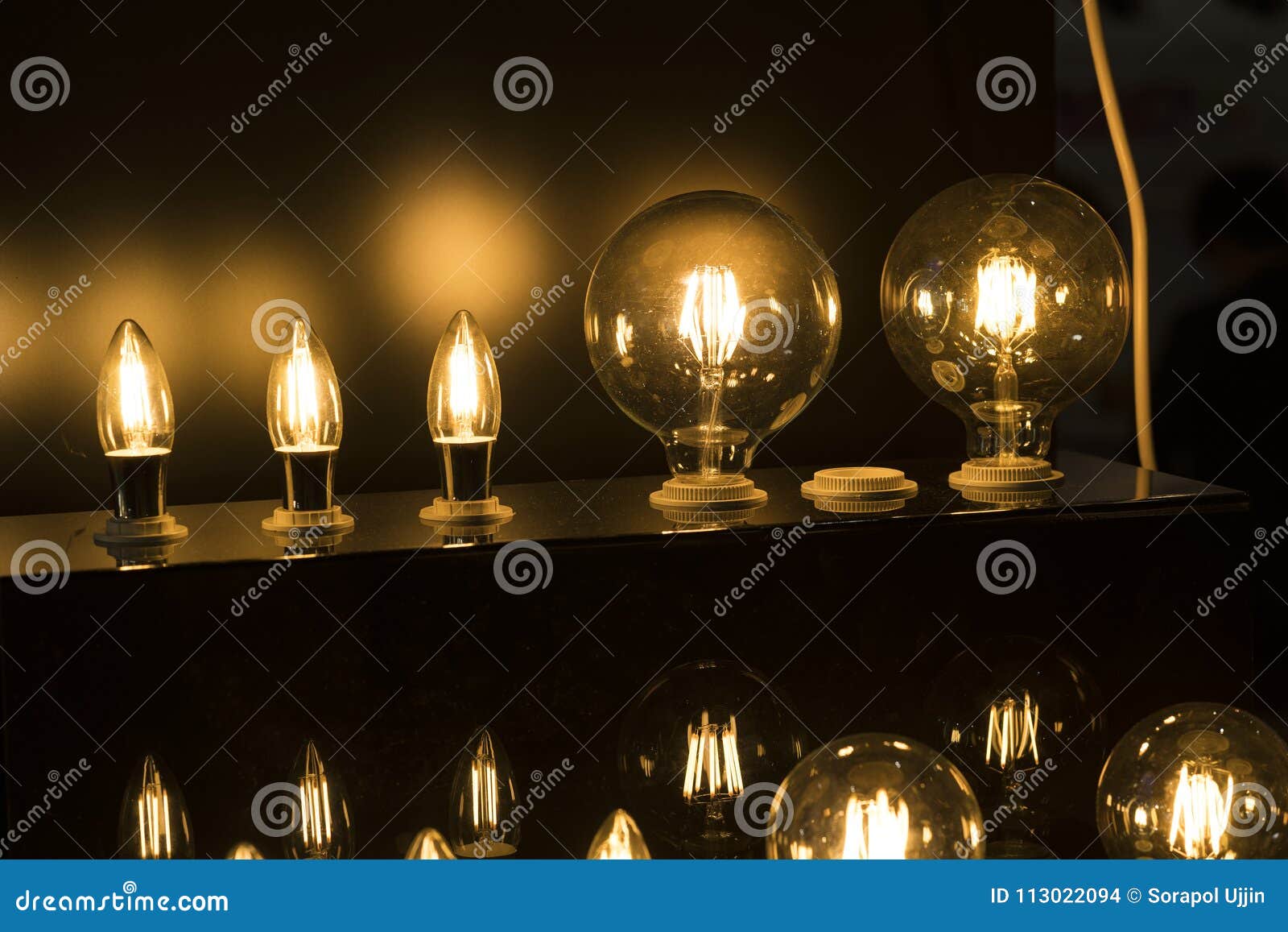 LED Light Bulb Hang from Ceiling Stock Photo - Image of glitter, design ...