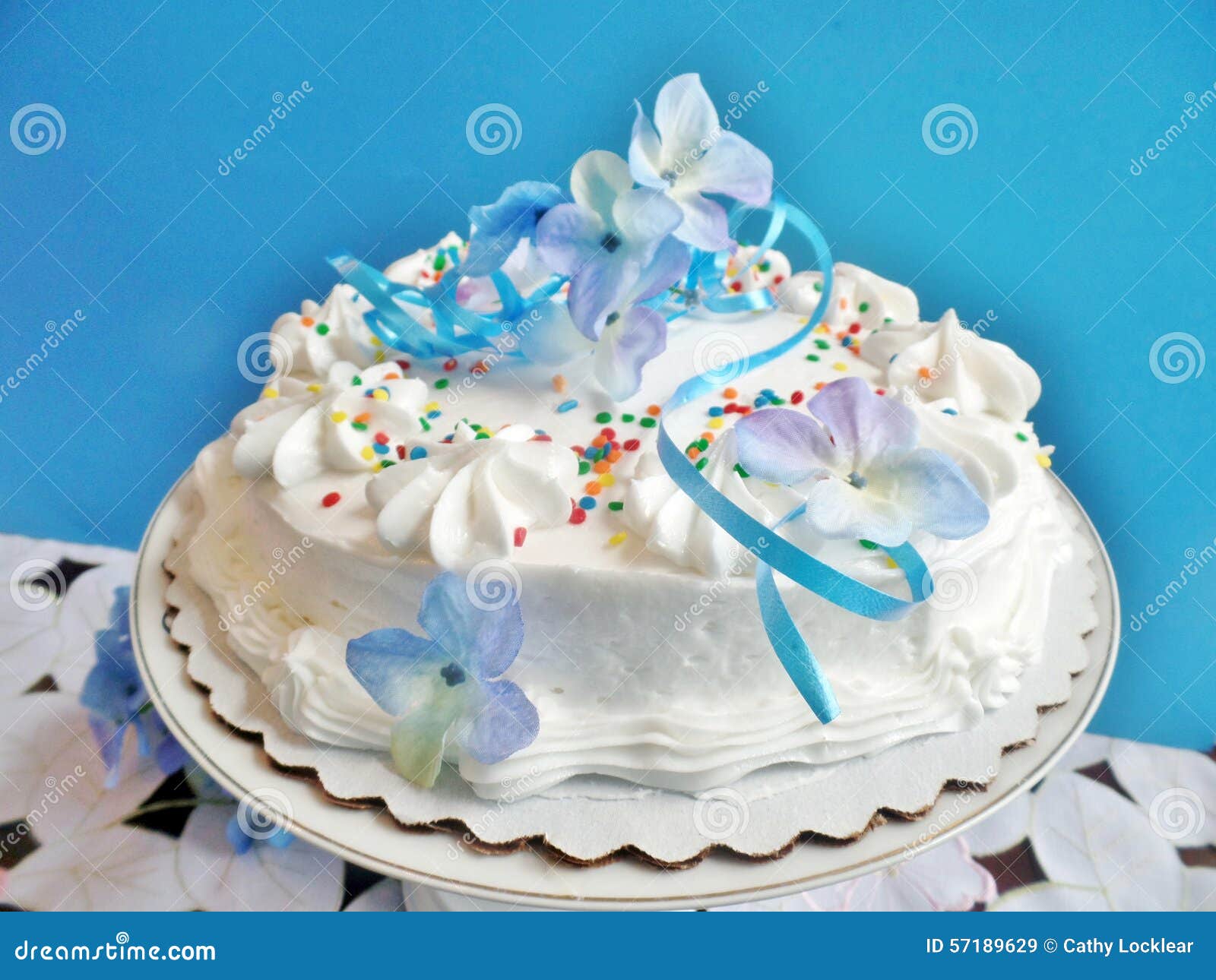 Decorated Cake with Blue Background Stock Image - Image of sweet, icing ...