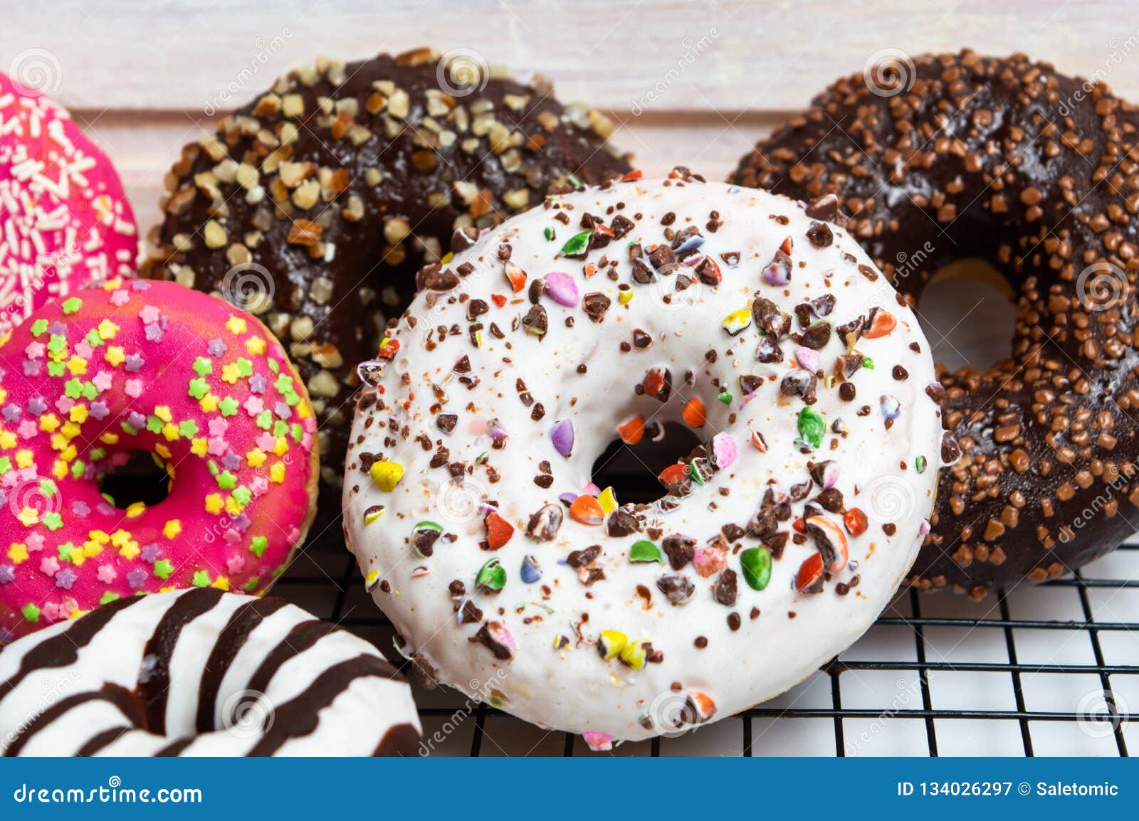 Decorated Chocolate Donuts on a Baking Grid Stock Image - Image of ...