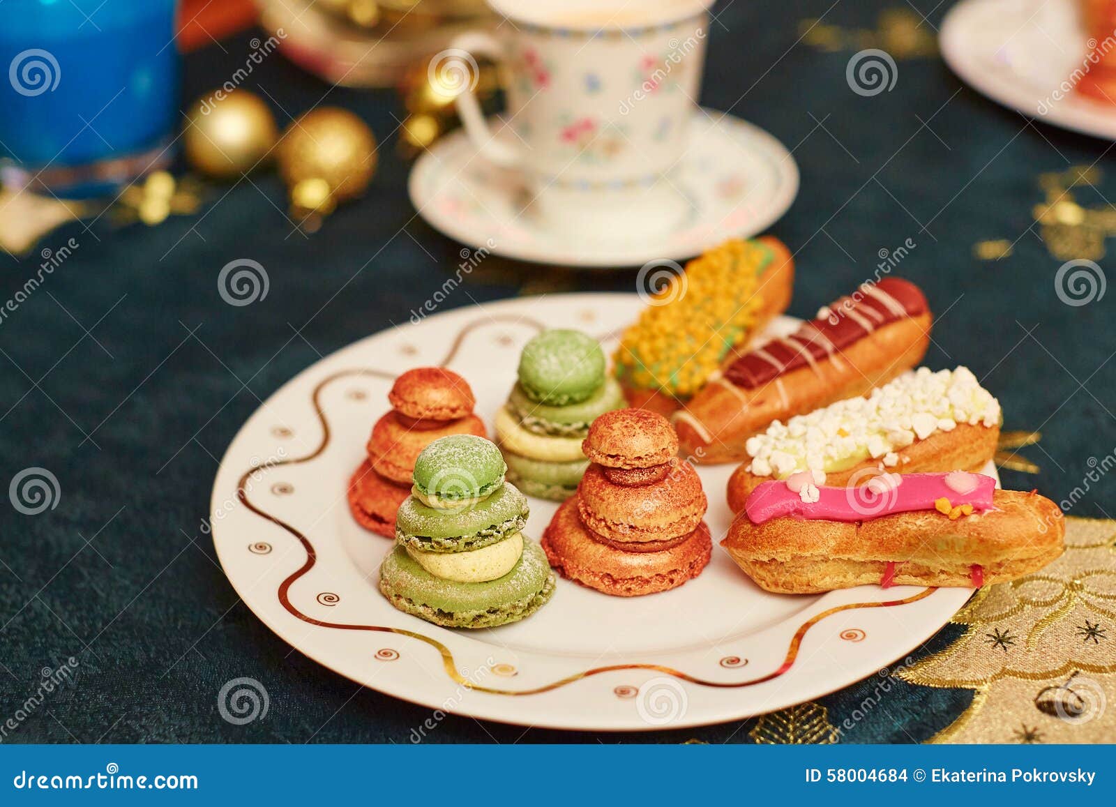Decorated Christmas Dining Table with Delicious Eclairs Stock Photo ...