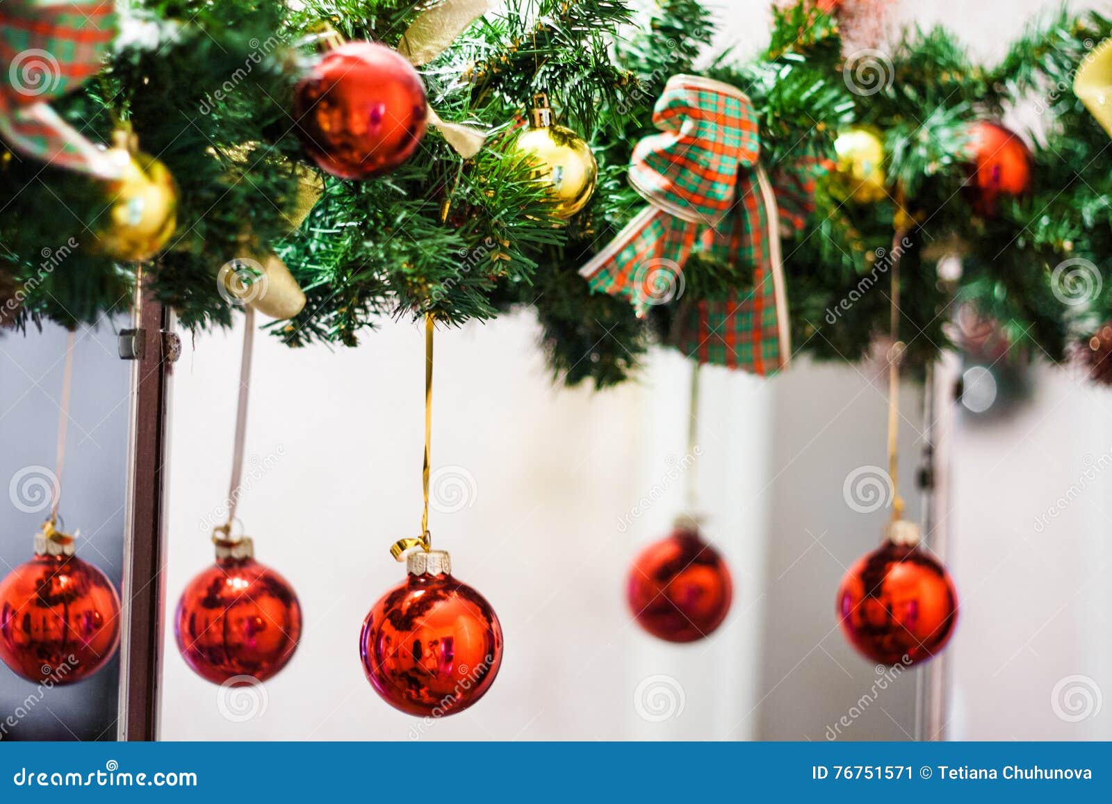 Decorated Christmas Tree Garland with Red Balls and Bows Stock Image ...