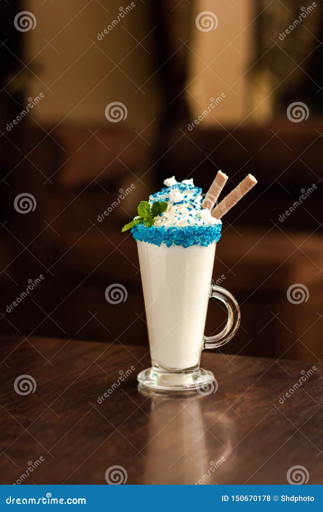 Decorated Milkshakes Blue on a Wooden Table. Copy Space. Stock Photo ...