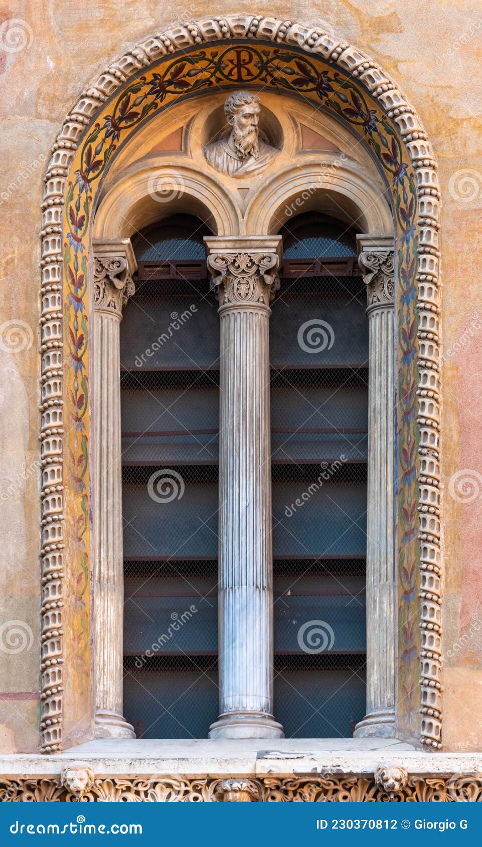 Decorated Window with Arch and Marble Columns in the Facade of Old ...