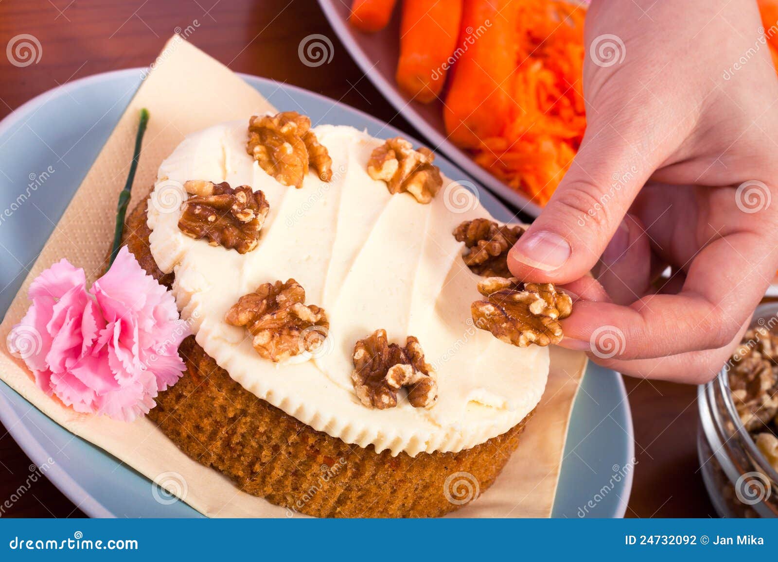 Decorating Carrot Cake with Walnuts Stock Photo - Image of dessert ...