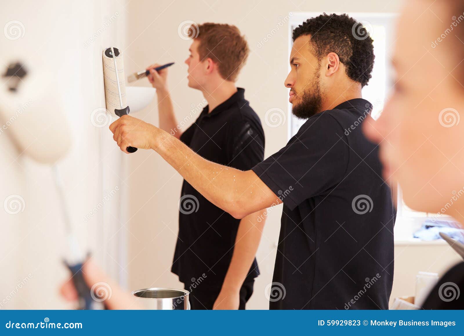 Decorating Team Painting a Room in a House Stock Image - Image of ...