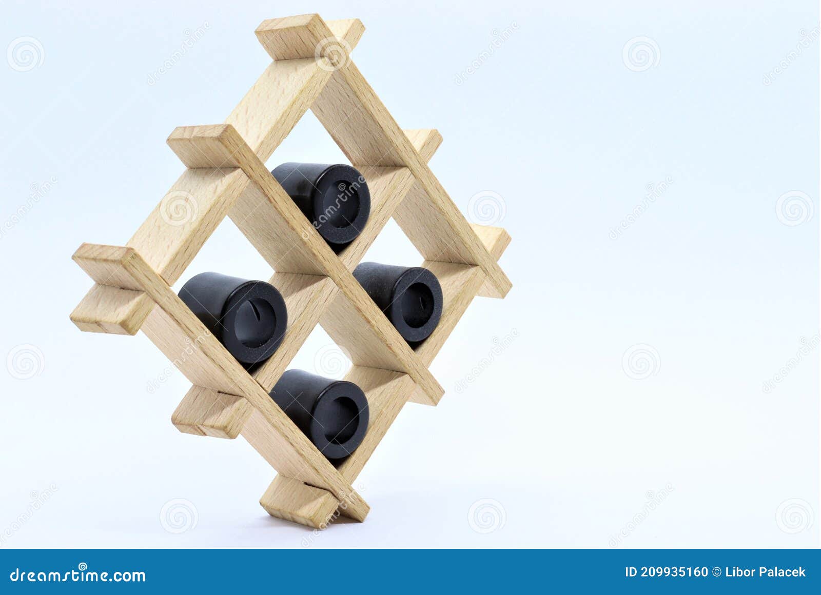 Decoration of Black Rollers Embedded in a Wooden Grid. Stock Photo ...