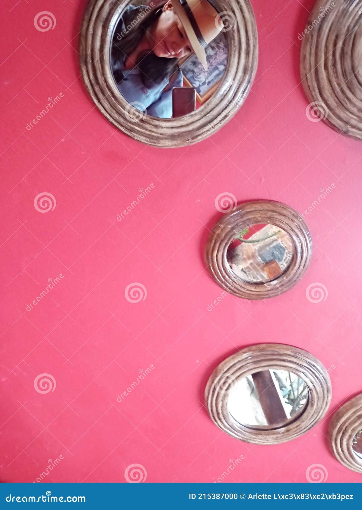 Decoration and Design of Red Wall with Mirrors and Reflection of Woman ...