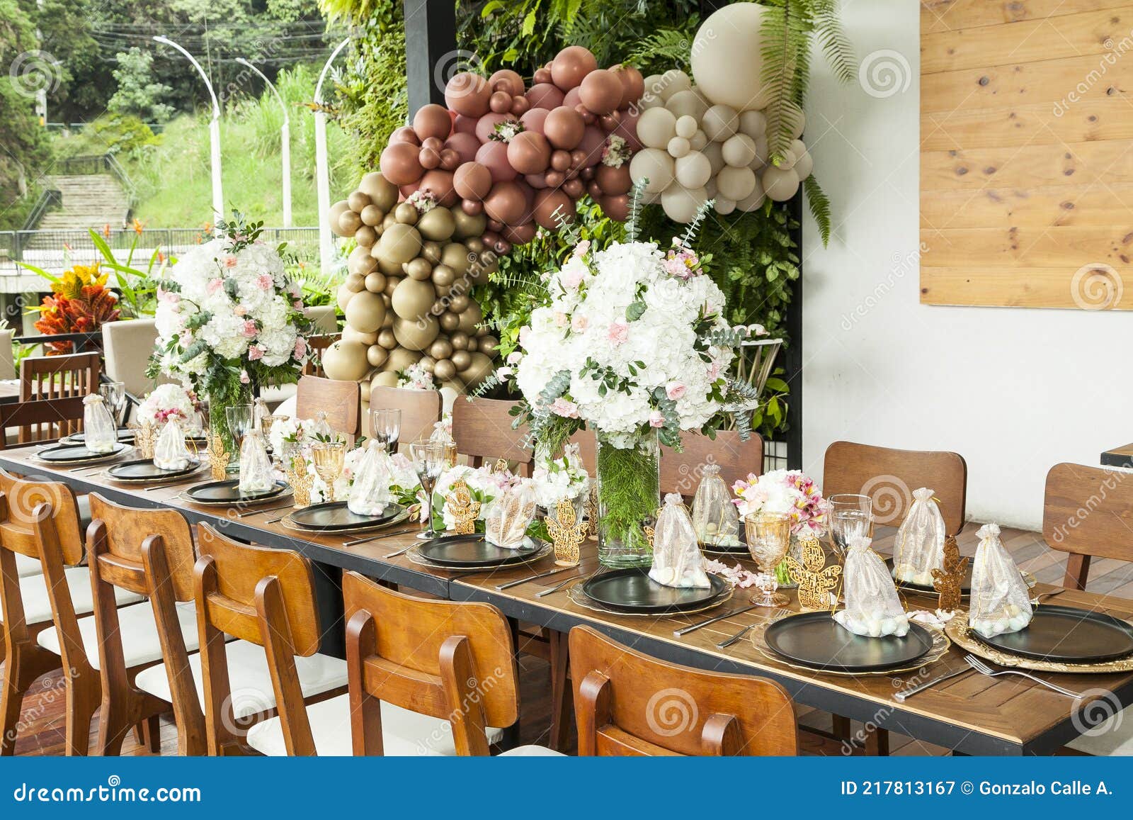 Decoration of Party; a Long Table Decorated with Flowers for the ...