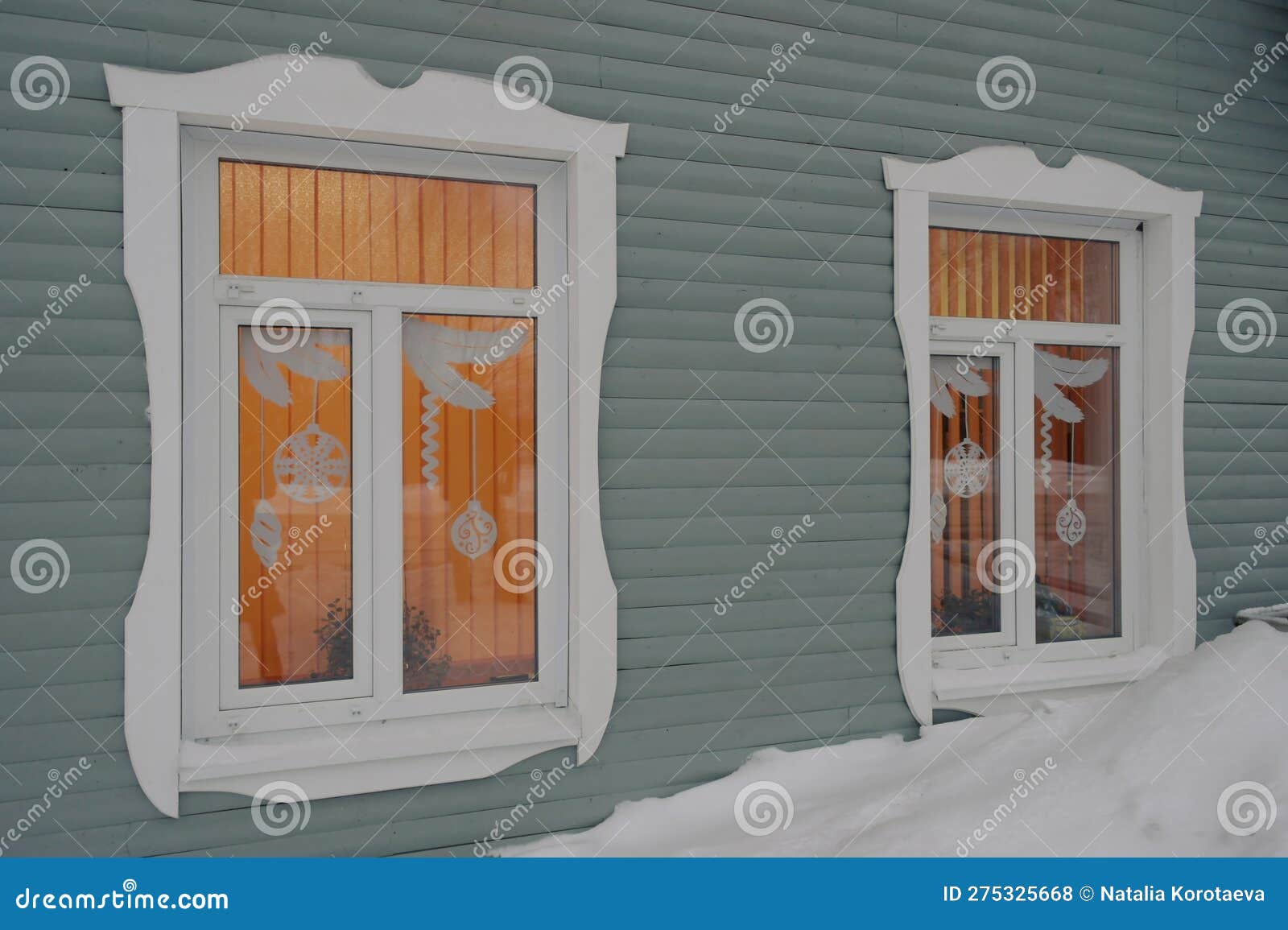 Decoration on the Windows on the First Floor of a Wooden House Stock ...
