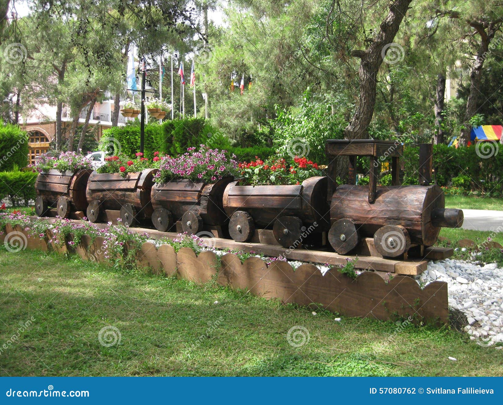 Decorations in Park with Flowers Growing in Wooden Train Stock Photo ...