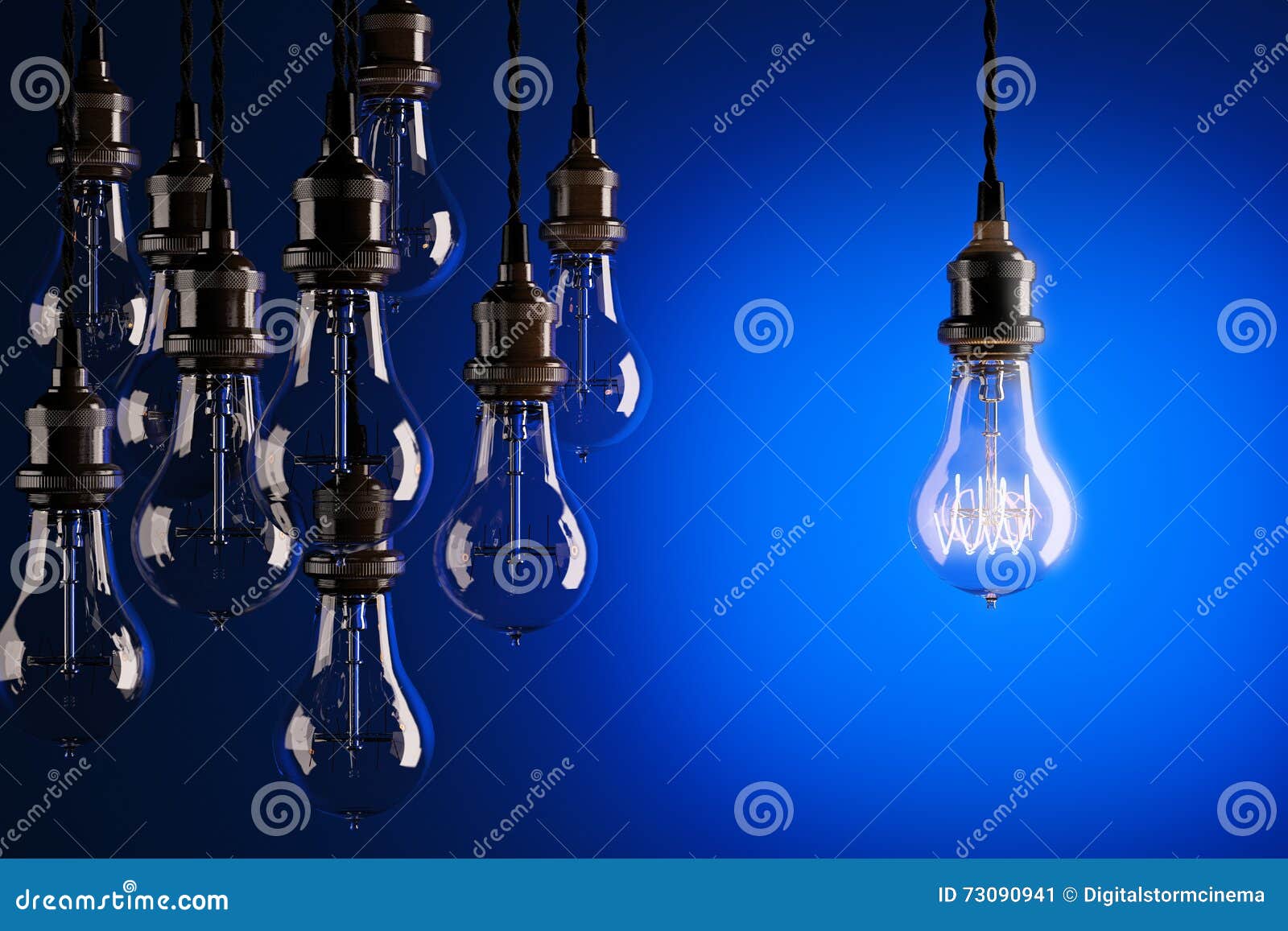 Decorative Antique Edison Style Light Bulbs Against a Blue Background ...