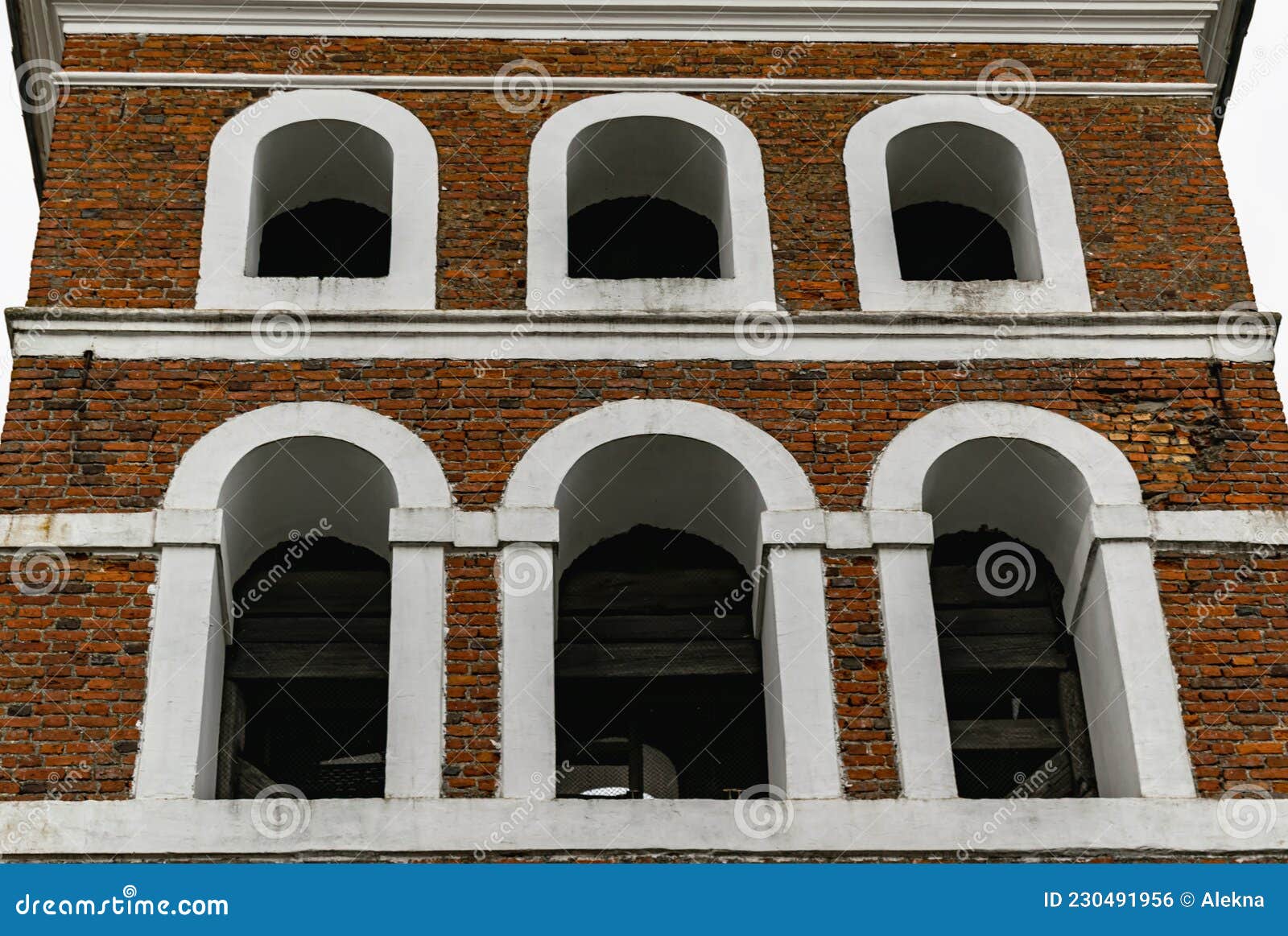 Decorative Arches and Windows on the Red Brick Wall of the Ancient ...