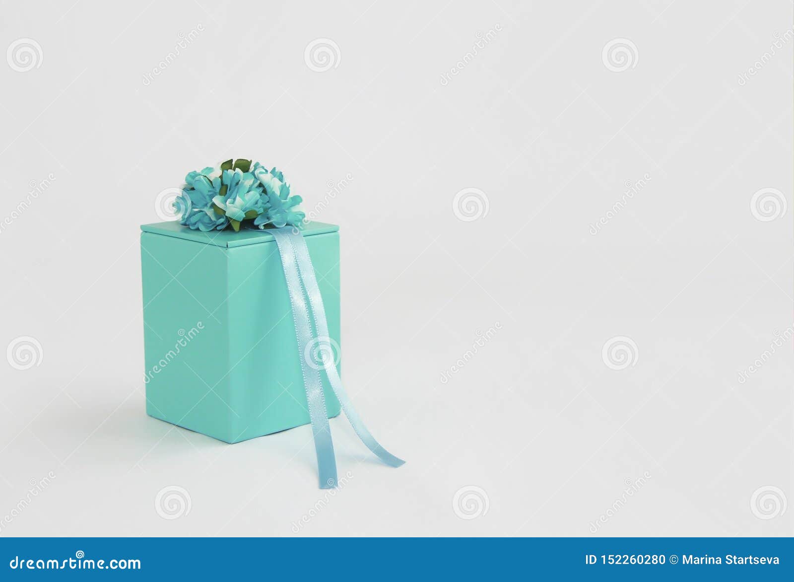 Decorative Blue Gift Box with Flower and Ribbon Designs Stock Photo ...
