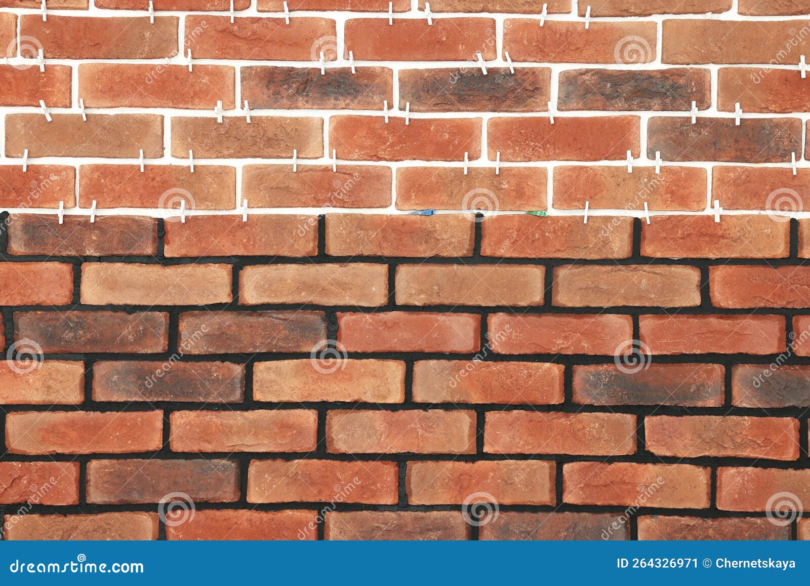 Decorative Bricks with Tile Leveling System on Wall Stock Image - Image ...