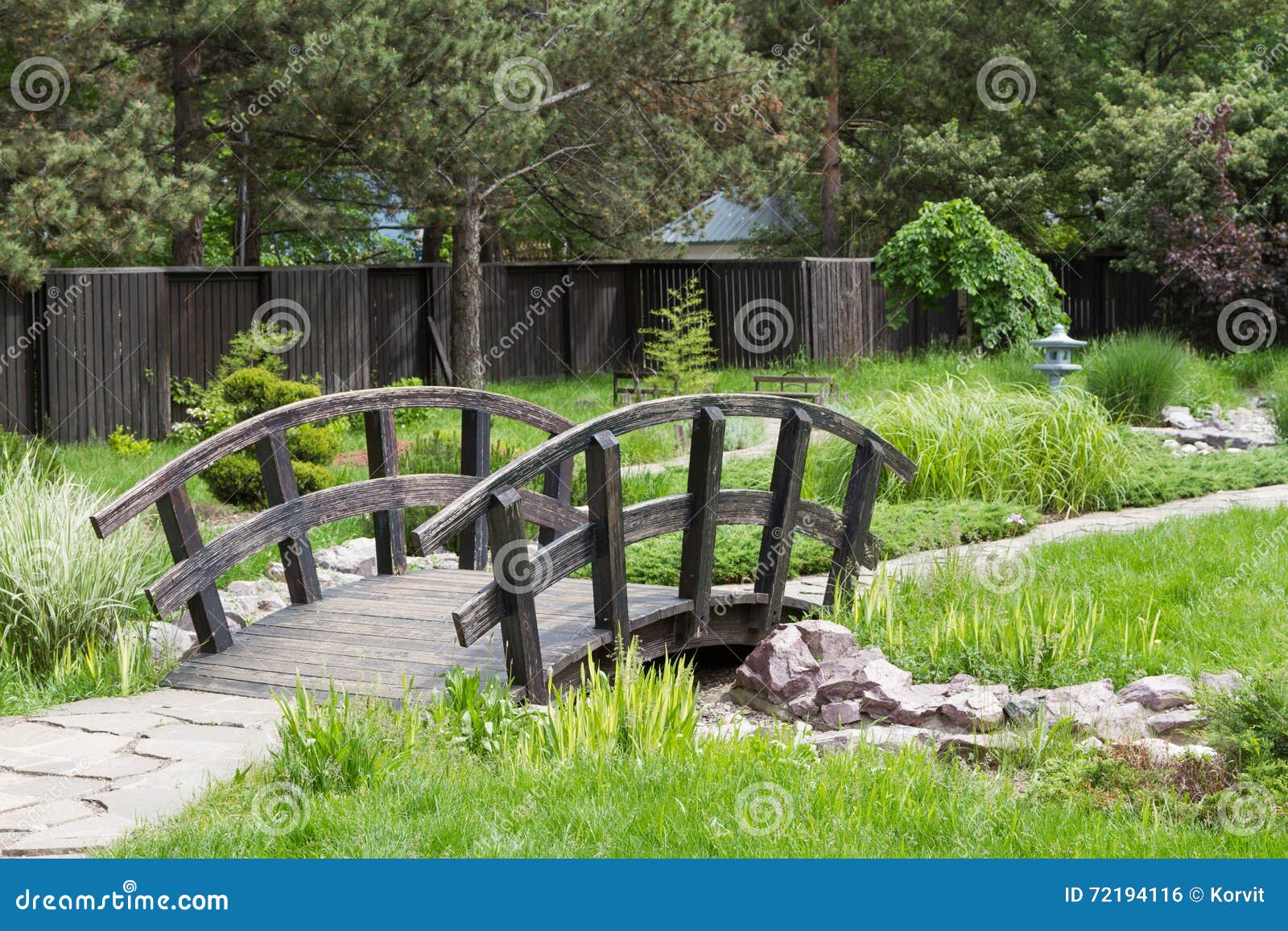 Decorative Bridge in the Garden Stock Photo - Image of grass ...