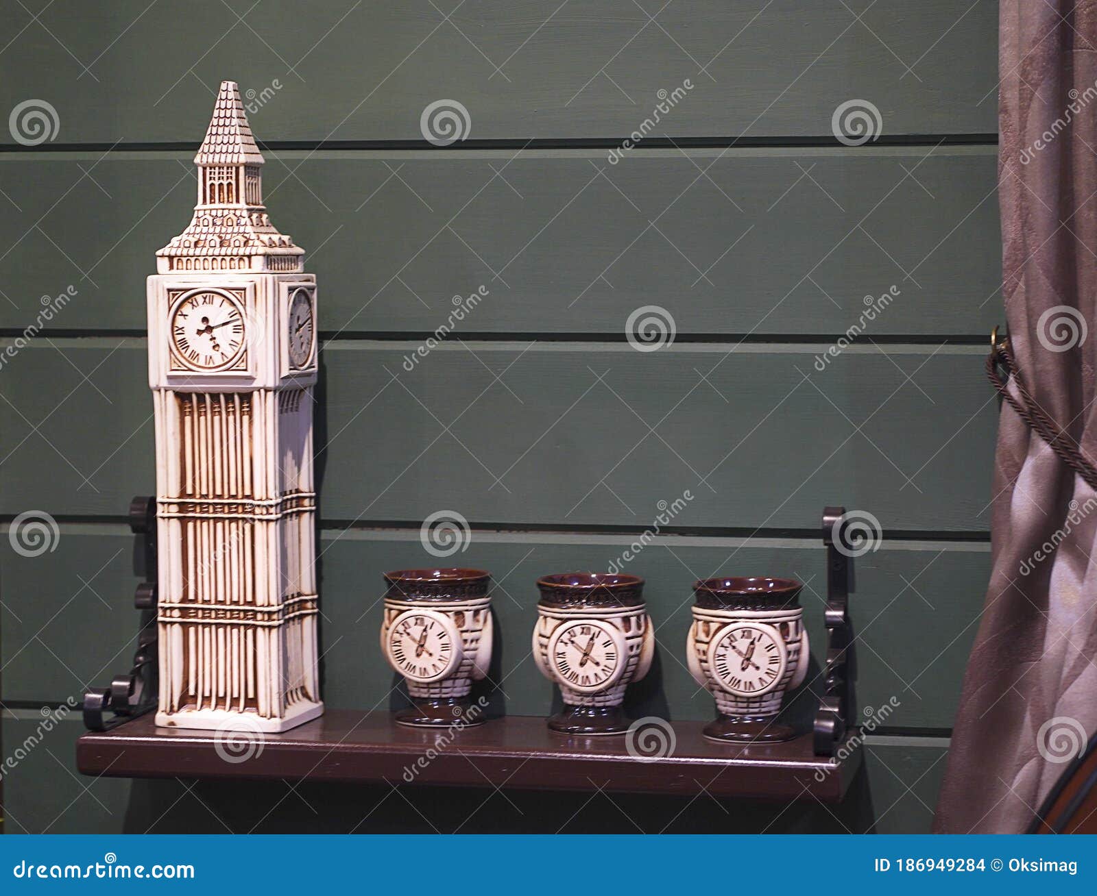 Decorative Ceramic Clock Tower and Cups in the Interior of Pub Stock ...
