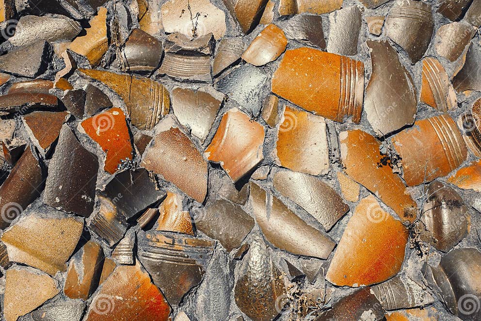 Decorative Ceramic Pieces Embedded on Cement Wall Stock Image - Image ...