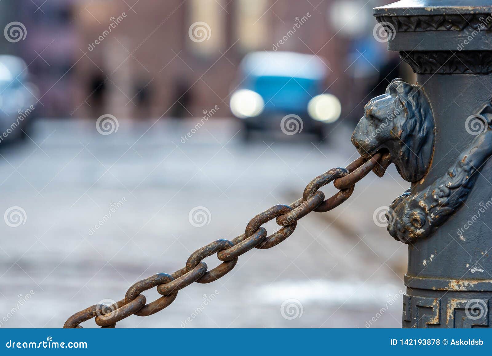 Decorative Columns with Lions and Chains in the Old Town Street ...