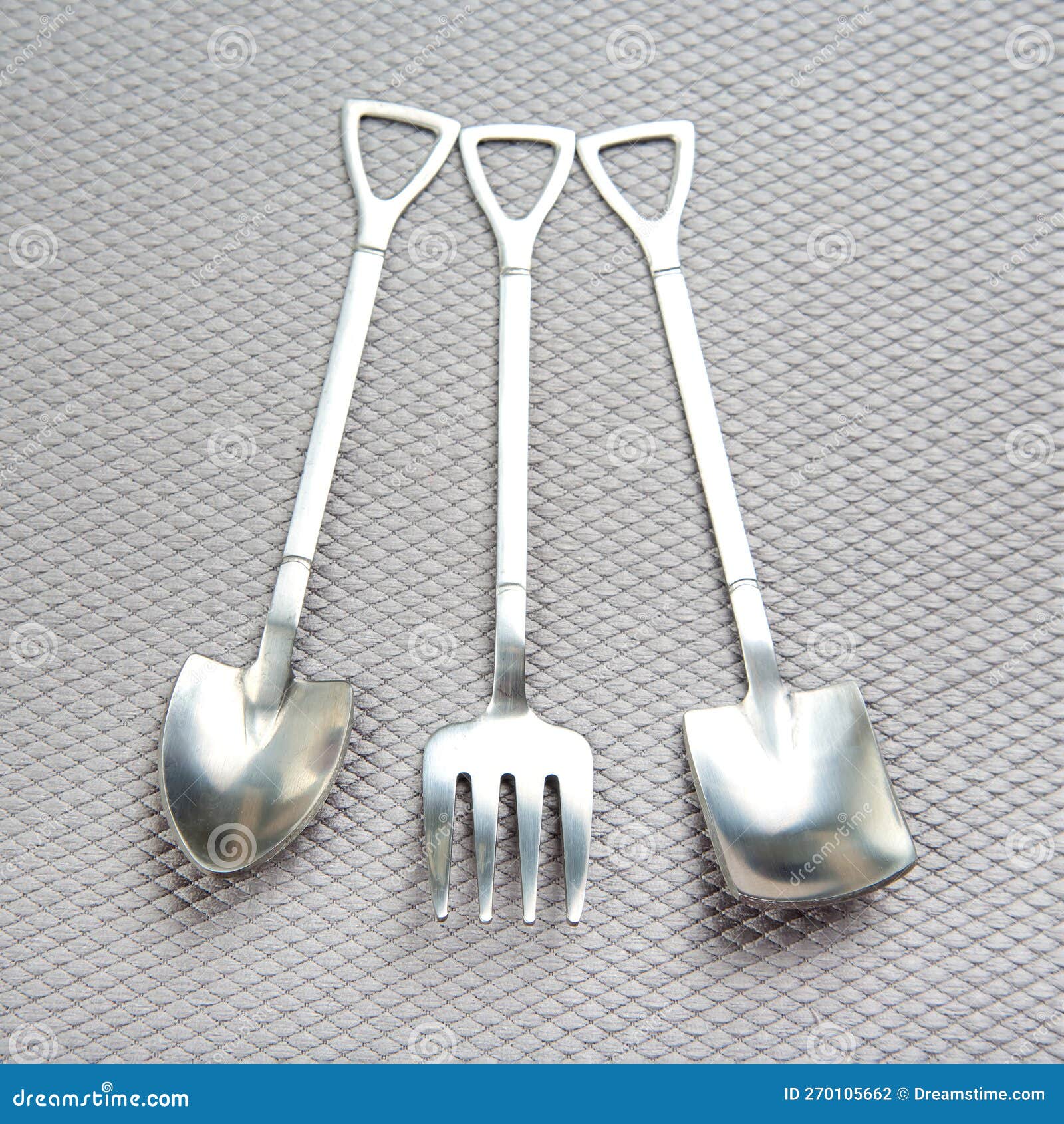 Decorative Fork and Spoons in the Form of Spades on a Gray Background ...