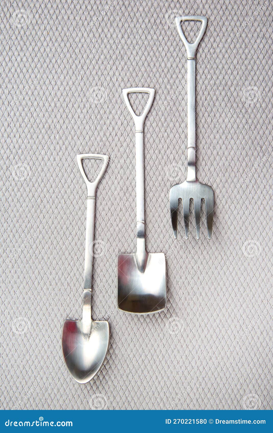 Decorative Fork and Spoons in the Form of Spades on a Gray Background ...