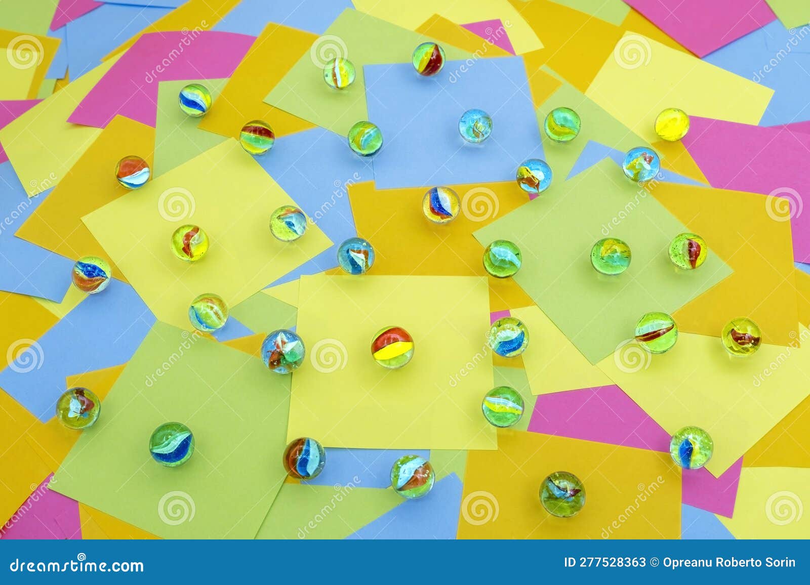 Decorative Glass Balls on a Background of Multicolored Paper Sticky ...