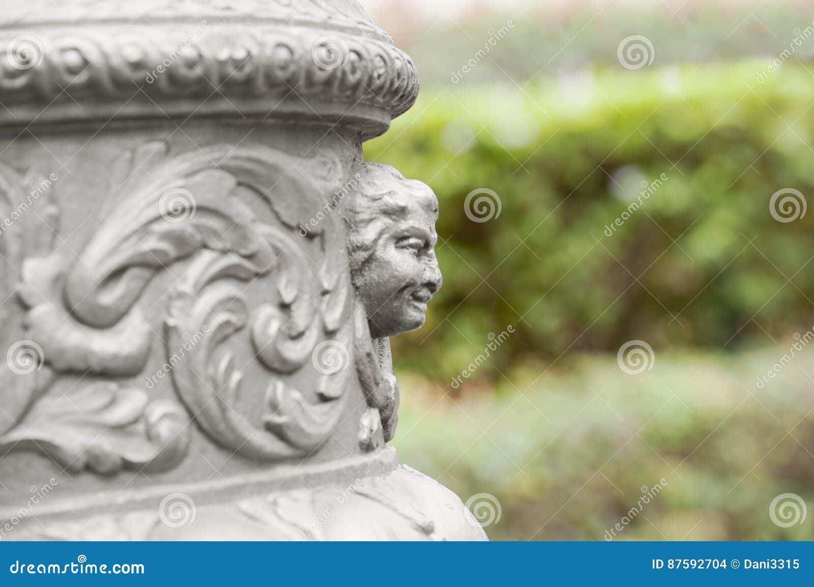 Decorative Head Column Sculpture on a Blurred Background Stock Photo ...