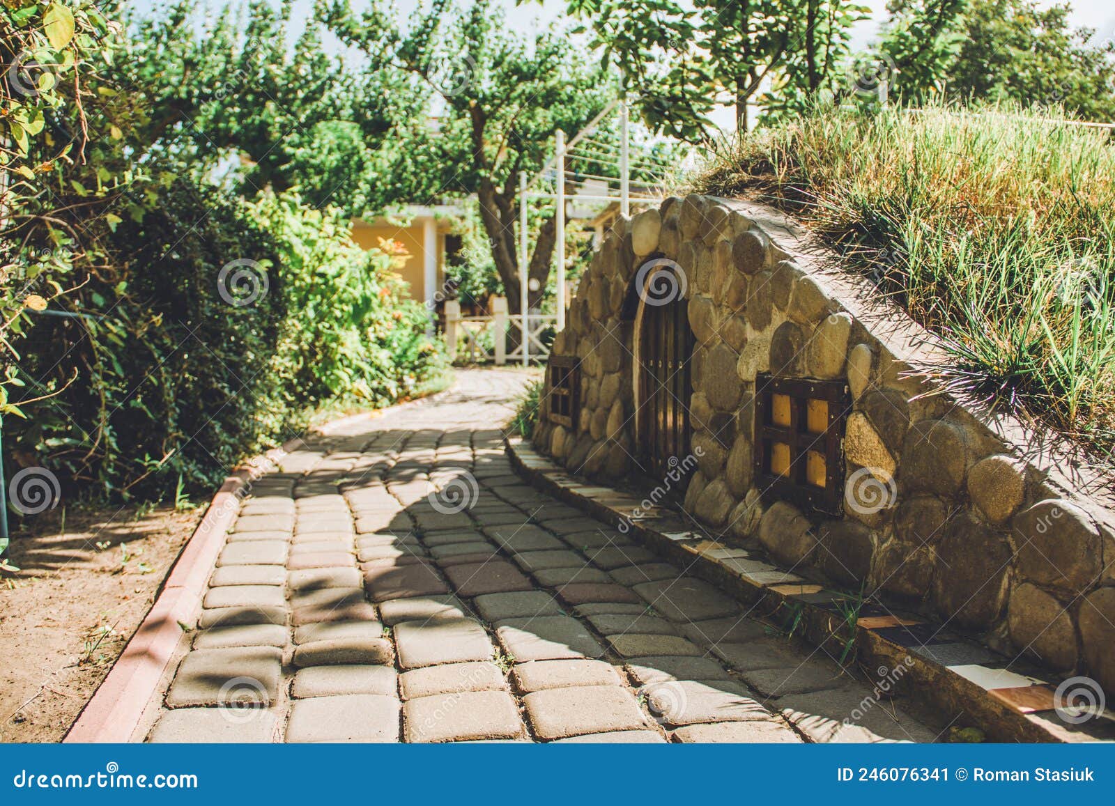 Decorative Hobbit House in the Garden. Path in the Garden Stock Image ...