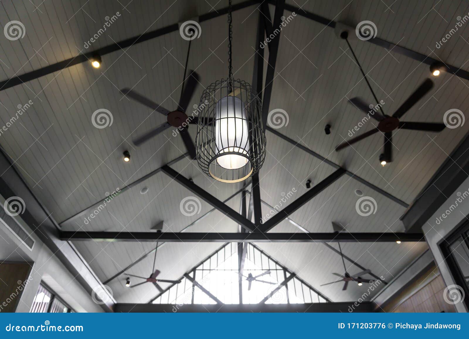 Decorative Lamp and Ceiling Fan Spinning in Motion Blur Stock Photo ...