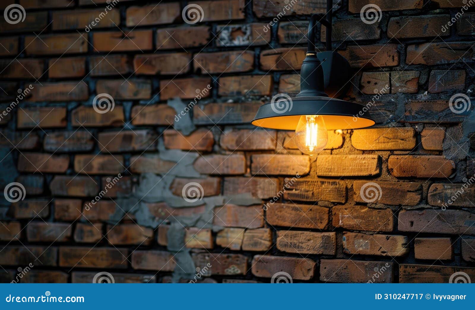Decorative Lamp in the Shape of a Pyramid on a Brick Wall Stock Image ...