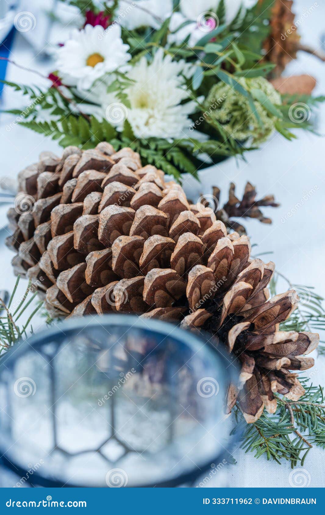 Decorative Large Pine Cone with Flowers on Table Stock Photo - Image of ...