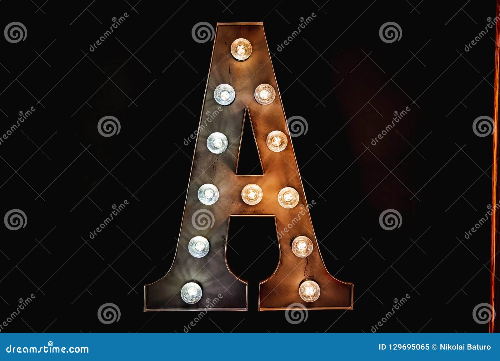 Decorative Letter with Light Bulbs Stock Image - Image of background ...