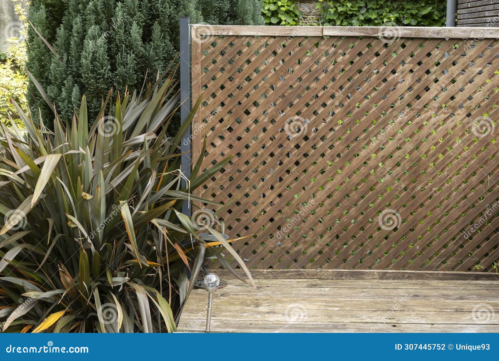 Openwork Wooden Cladding on the Edge of a Garden Terrace Stock Photo ...