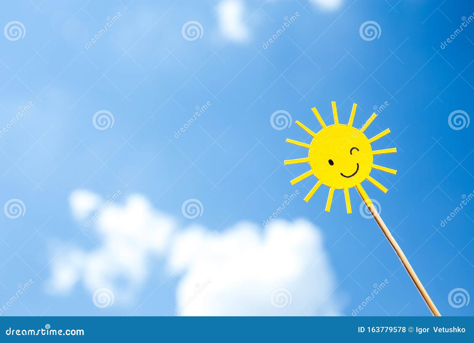 Decorative Paper Cut Winking Sun on Stick Stock Photo - Image of ...