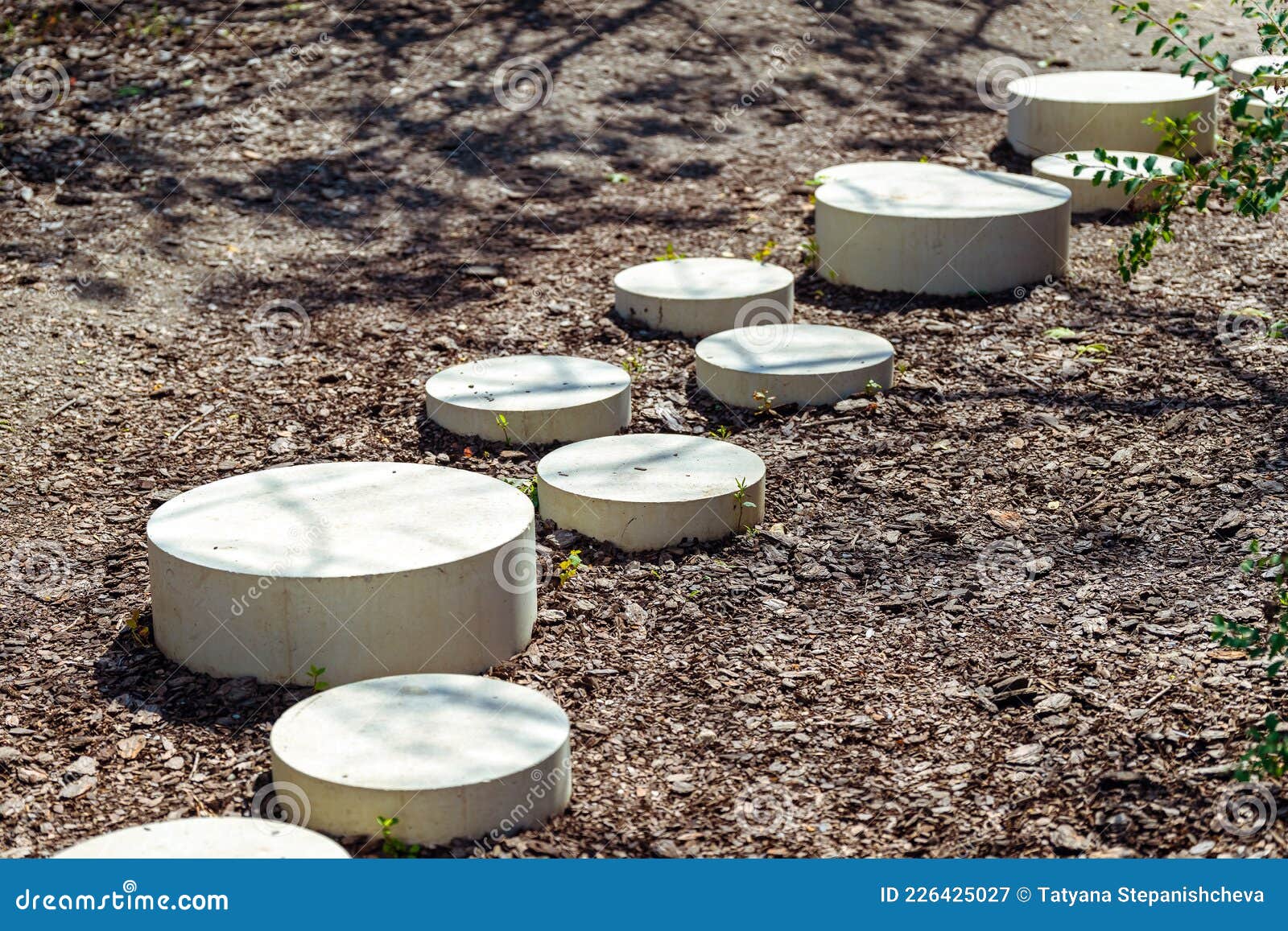 The Decorative Path in the Park is Made of Round Concrete Stones. Stock ...