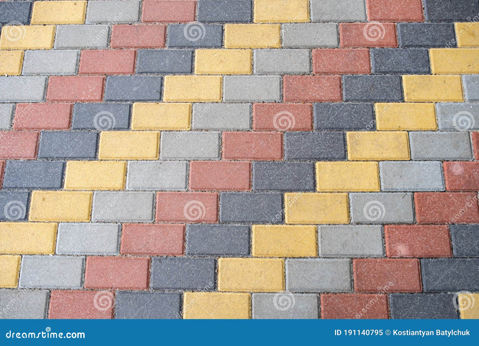 Decorative Paving Slabs of Different Colors Lined with a Snake Pattern ...