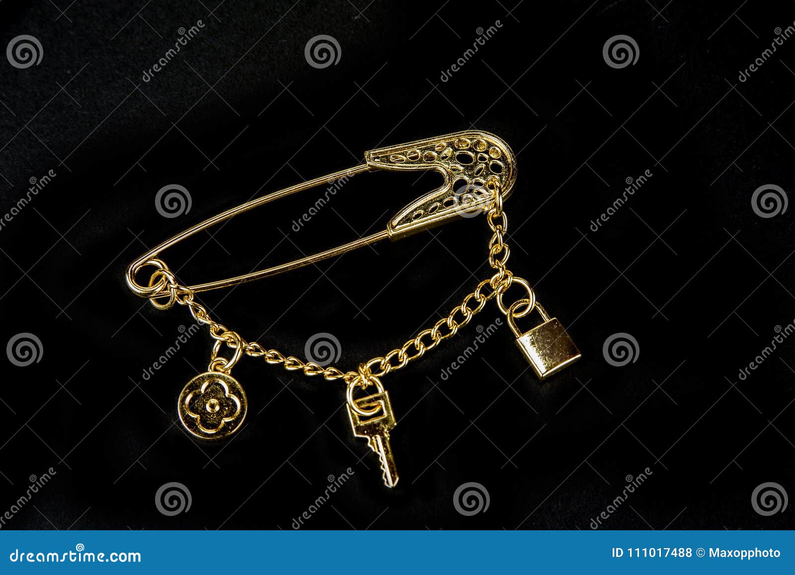 Decorative Safety Pin with Chain on Black. Stock Photo - Image of path ...