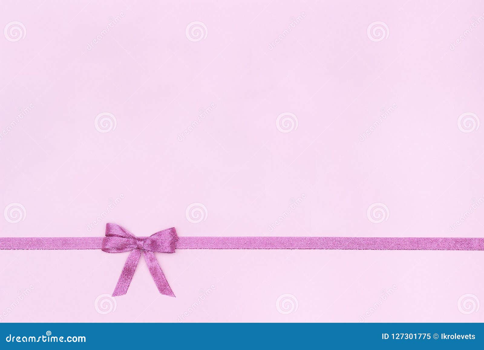 Decorative Shiny Ribbon With Bow On Pastel Pink Background With Copy ...