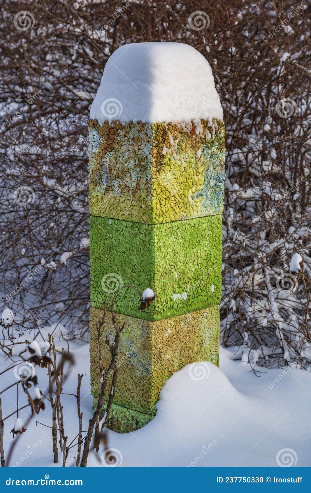 The Decorative Column in the Garden is Covered with Snow Stock Photo ...