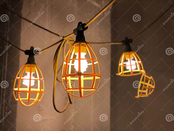 A Decorative String of Light Bulbs Beautifully Hanging from a Wire ...