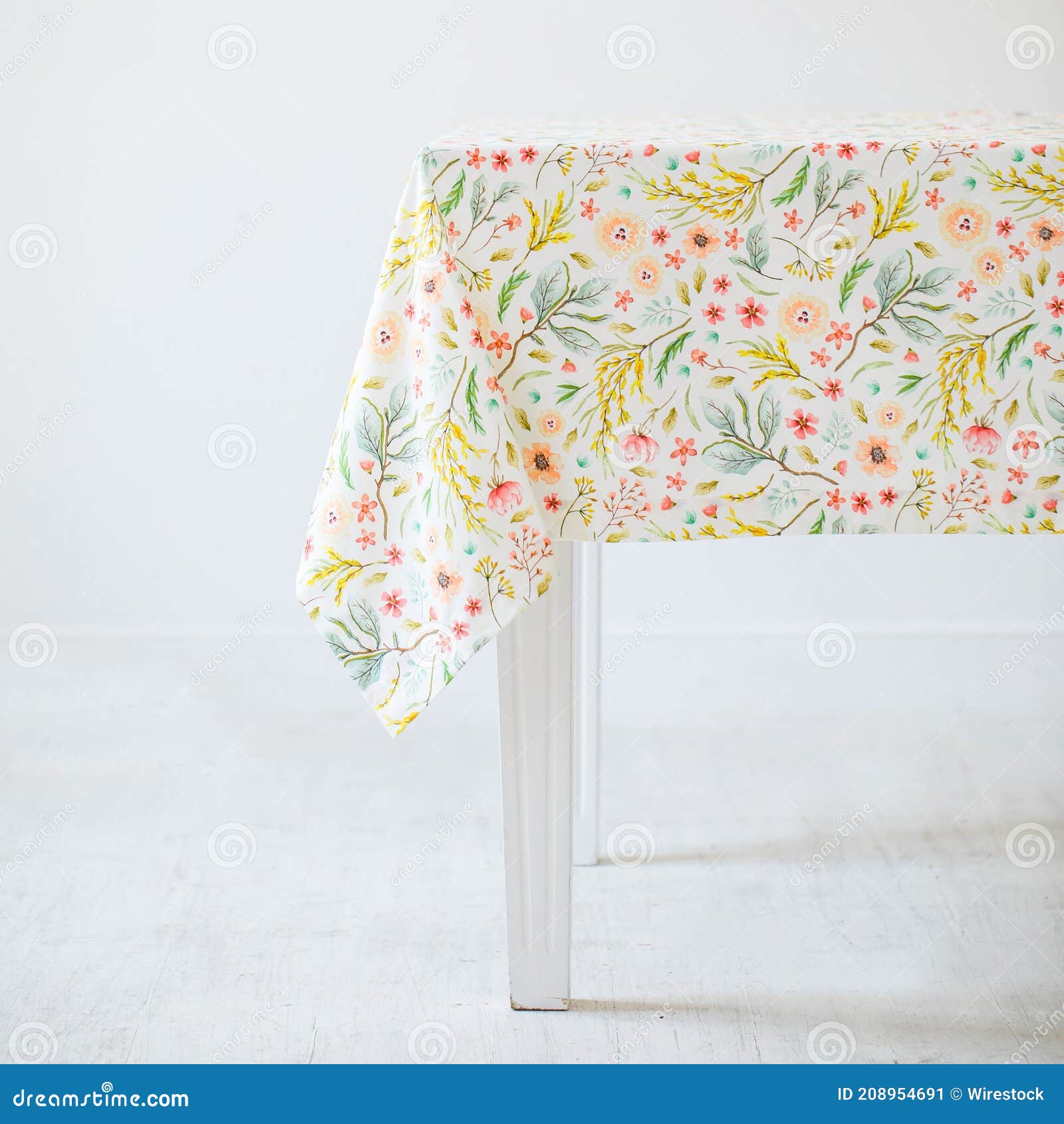Decorative Tablecloth with Floral Patterns on a Table on a White ...