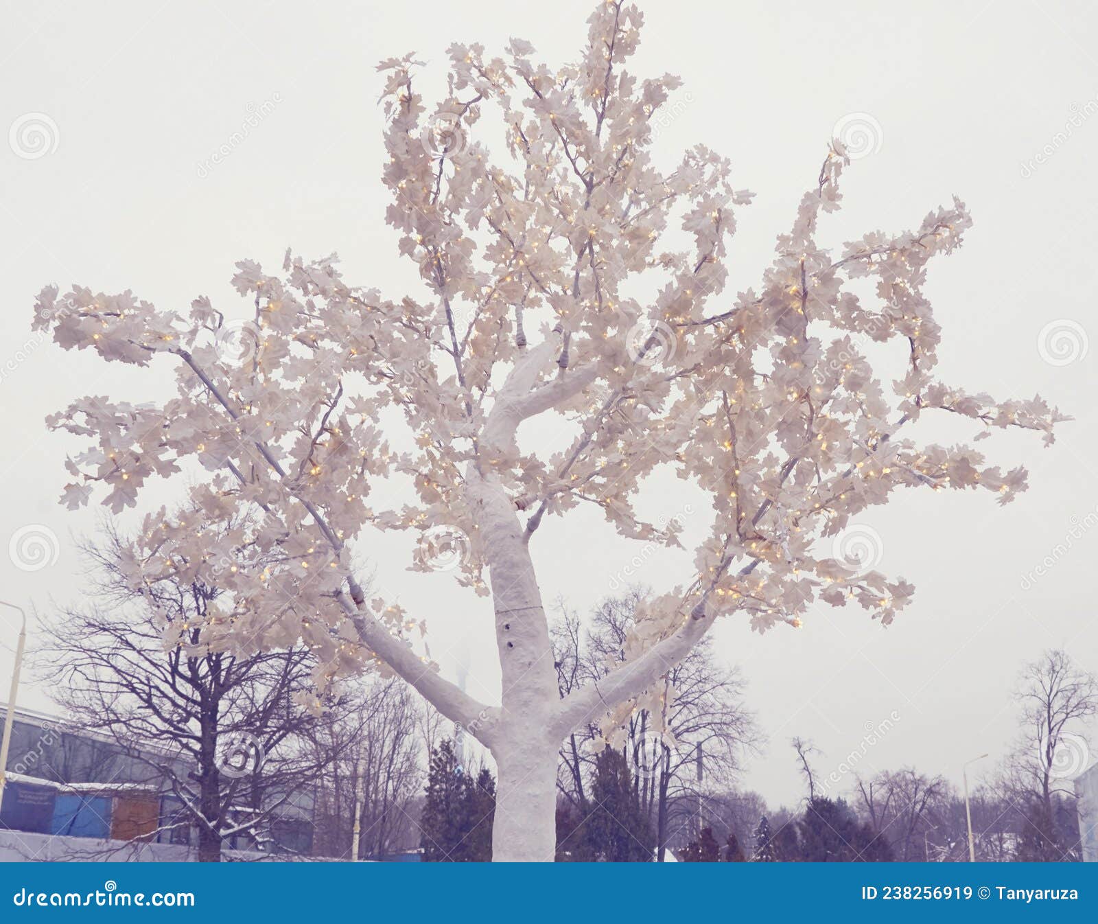 Decorative Tree with Yellow Lanterns on the Branches. Christmas ...