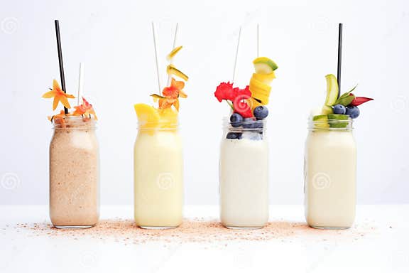 Decorative Vanilla Shake Quartet, Each with Different Toppings, White ...
