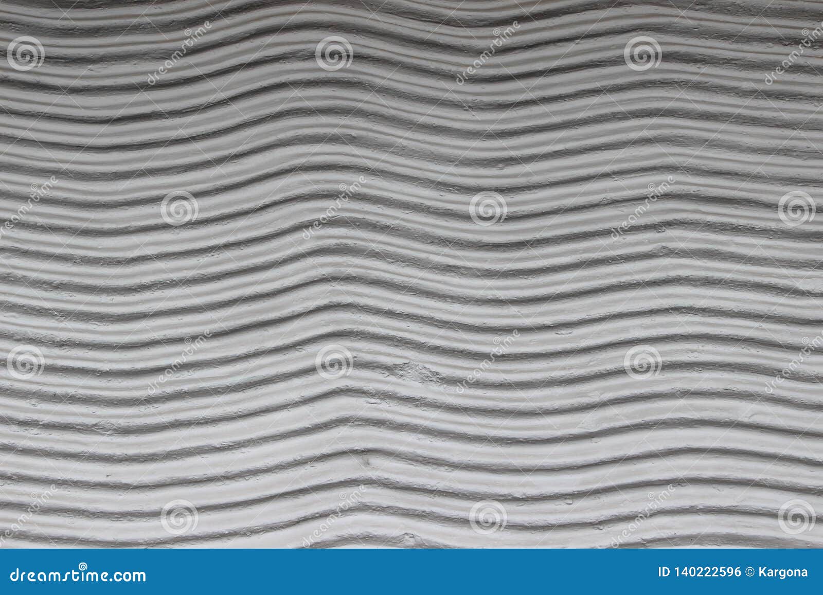 A Decorative Wall with a Wavy Structure Painted in Gray Stock Photo ...