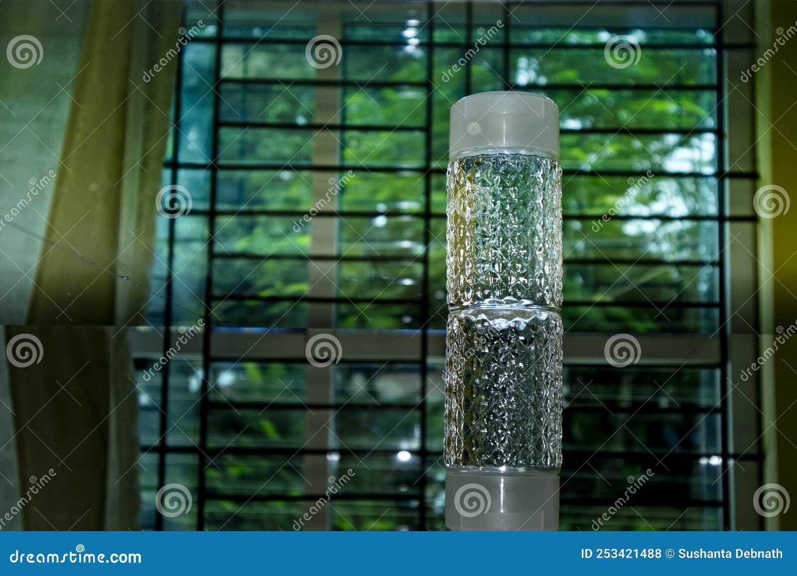 A Decorative Water Bottle on the Table Stock Photo - Image of fluid ...