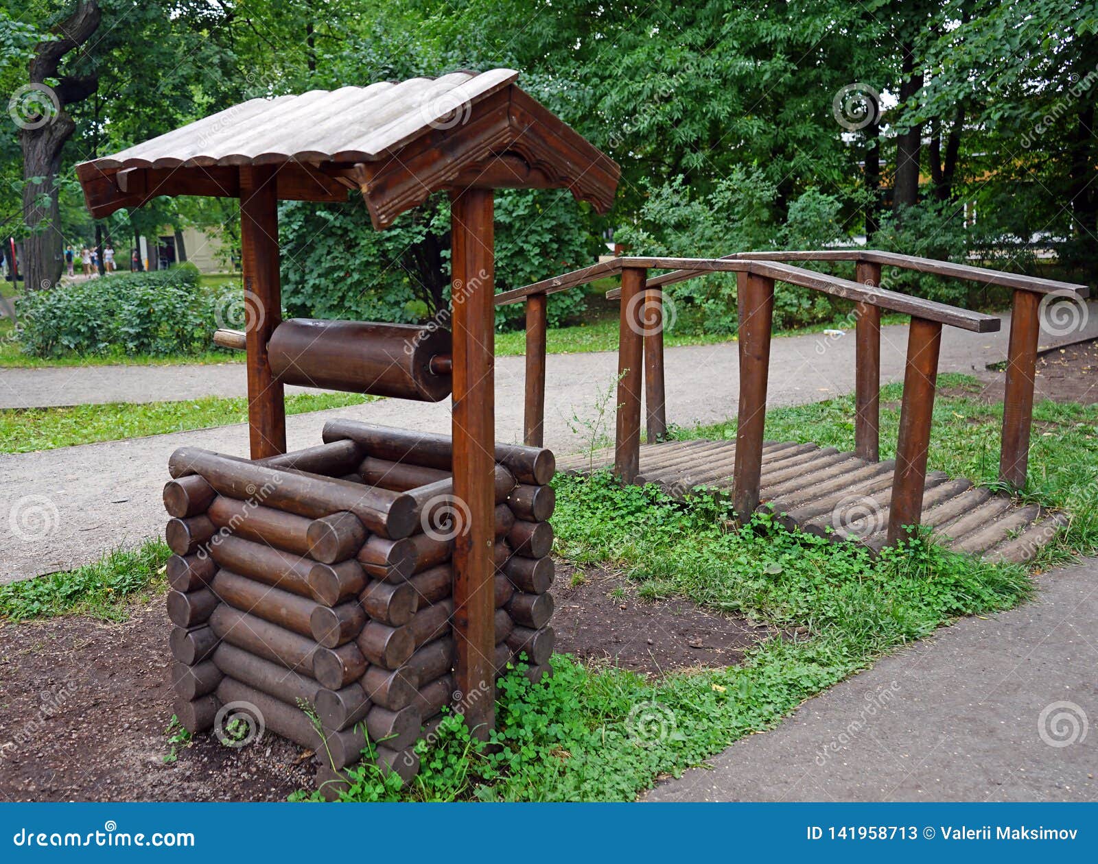 Decorative Well and a Small Bridge in the City Park Stock Image - Image ...