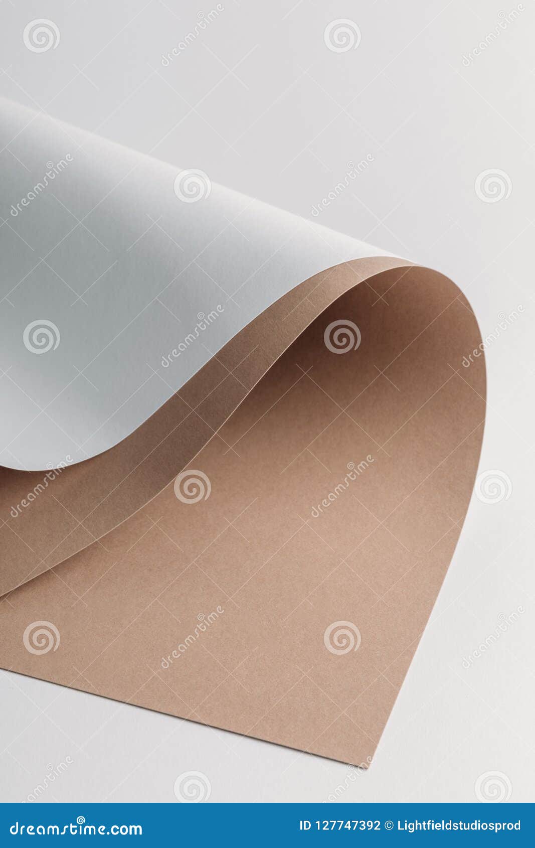 Decorative White and Brown Paper Sheets on Grey Background Stock Photo ...