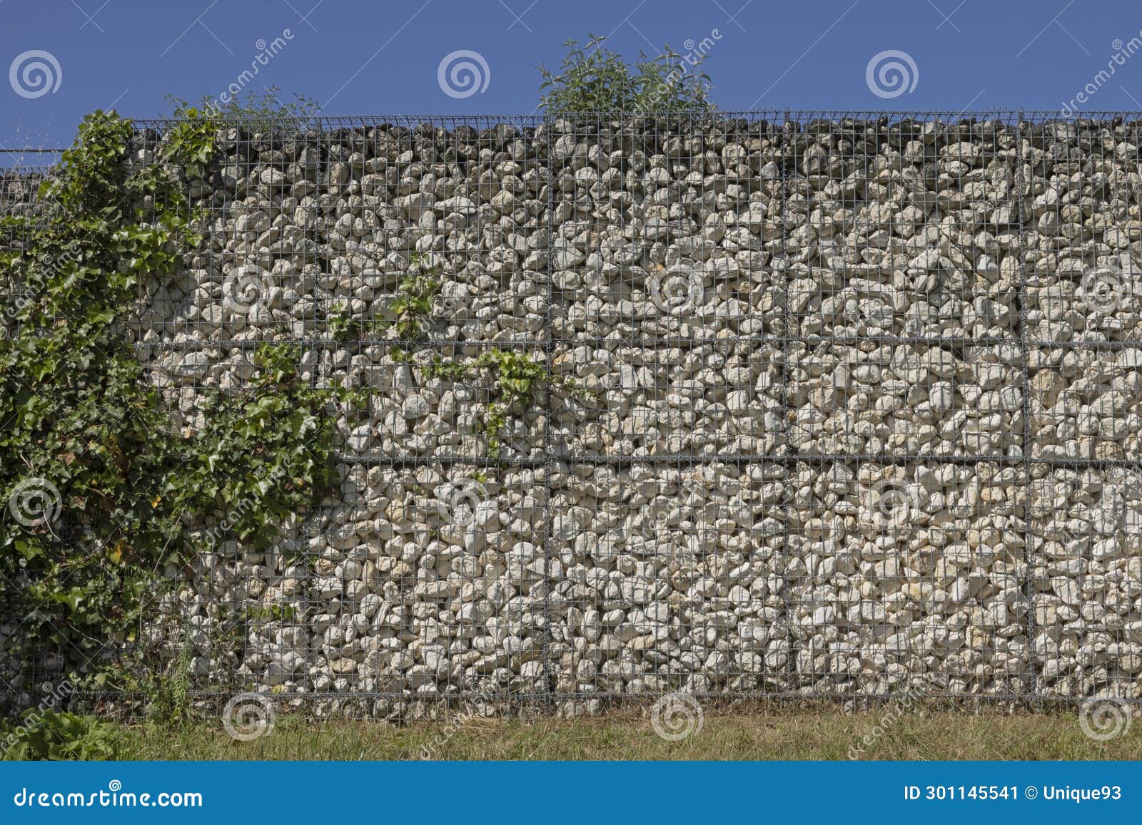 Decorative White Pebble Gabion Retaining Wall Stock Image - Image of ...