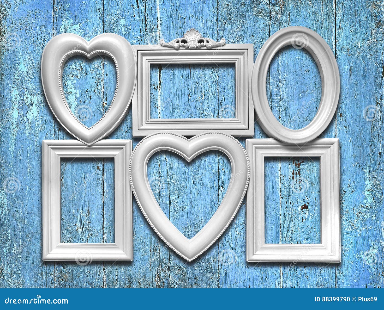 Decorative White Photo Frames on a Blue Wooden Background Stock Photo ...