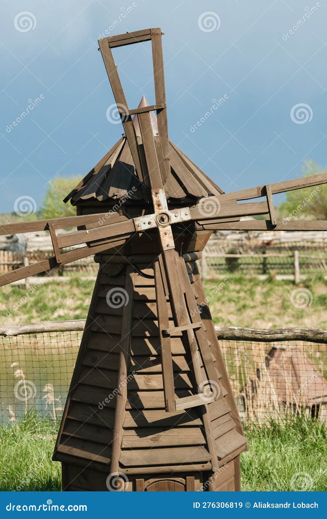 Decorative Wooden Mill Standing Outside in Summer Stock Image - Image ...