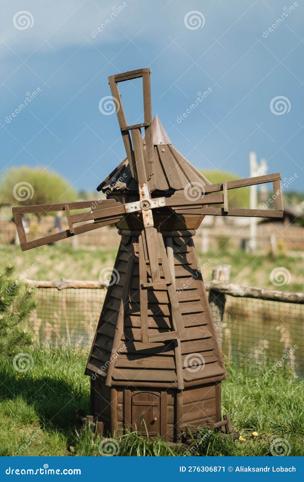 Decorative Wooden Mill Standing Outside in Summer Stock Image - Image ...
